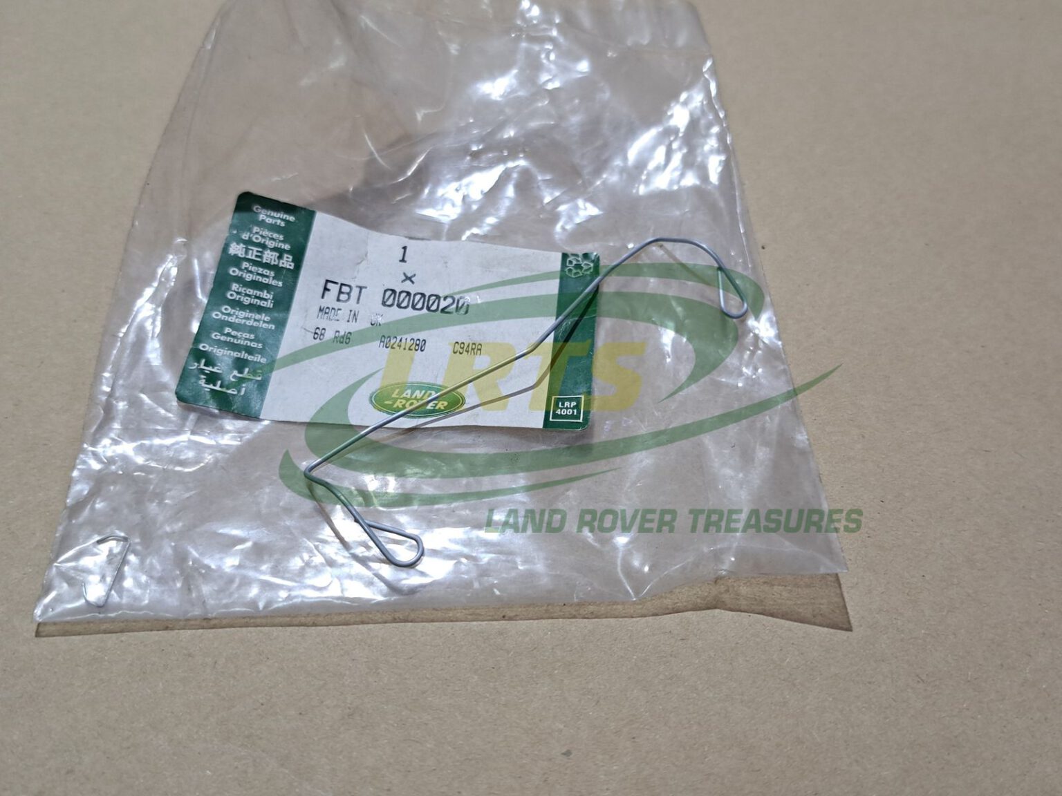 FBT000020 RETAINER WIRE RADIO BEZEL LAND ROVER DEF - Land Rover ...