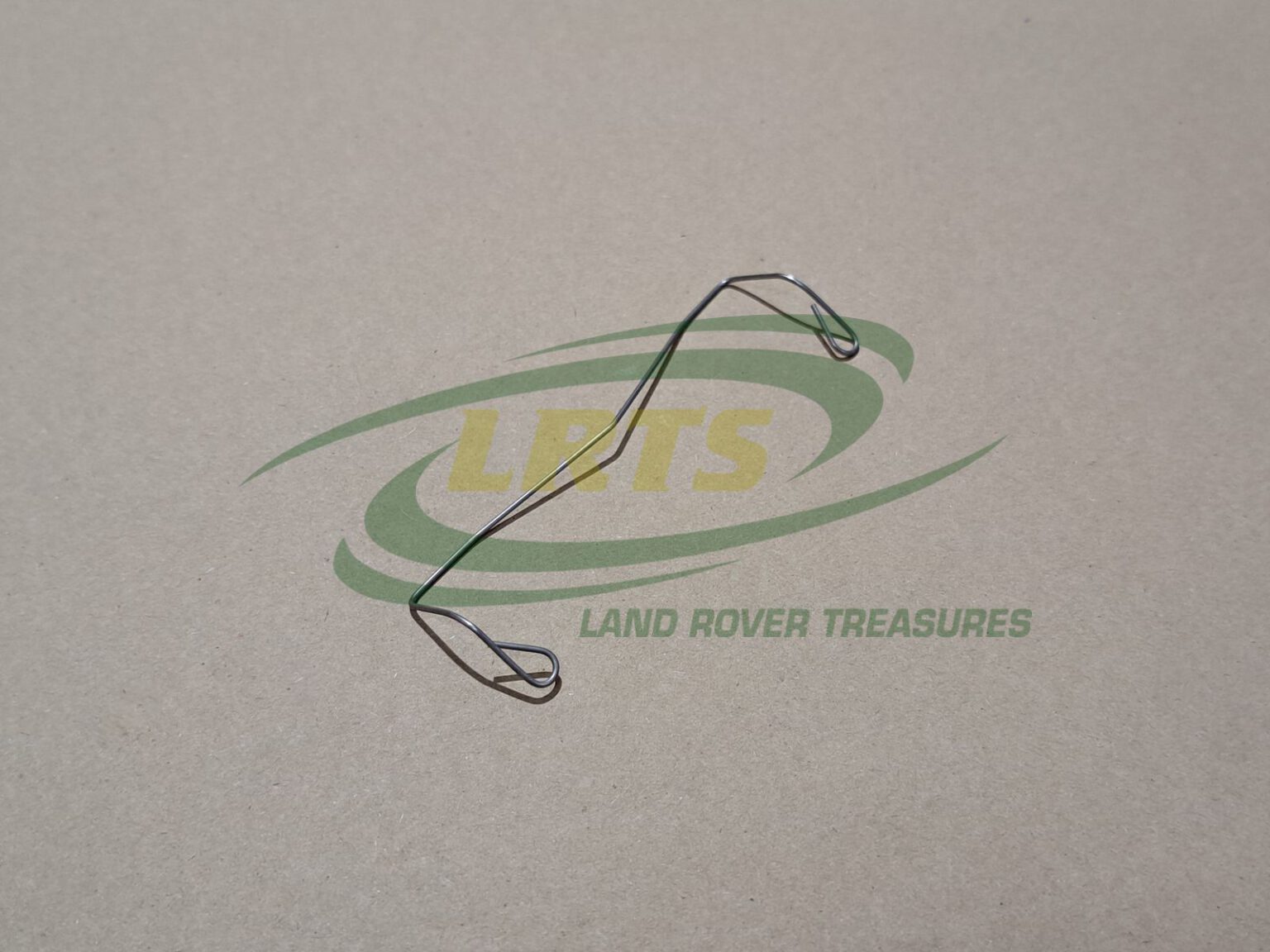 FBT000020 RETAINING WIRE RADIO BEZEL LAND ROVER DEF - Land Rover ...