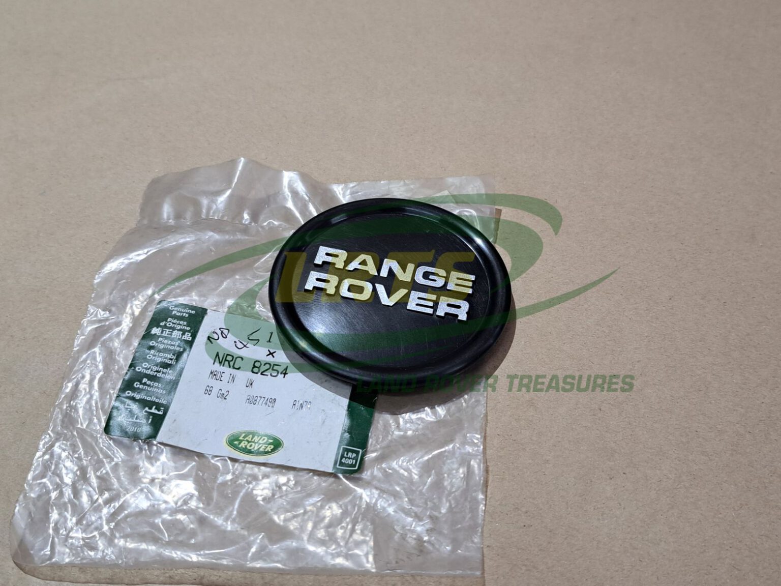 NRC8254 BLACK CAP ROAD WHEEL LAND ROVER RRC - Land Rover Treasure Shop